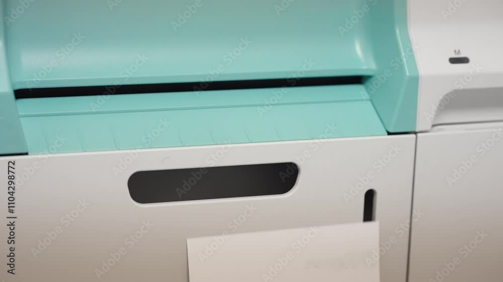 Office printer producing a color test chart for quality control. A high ...