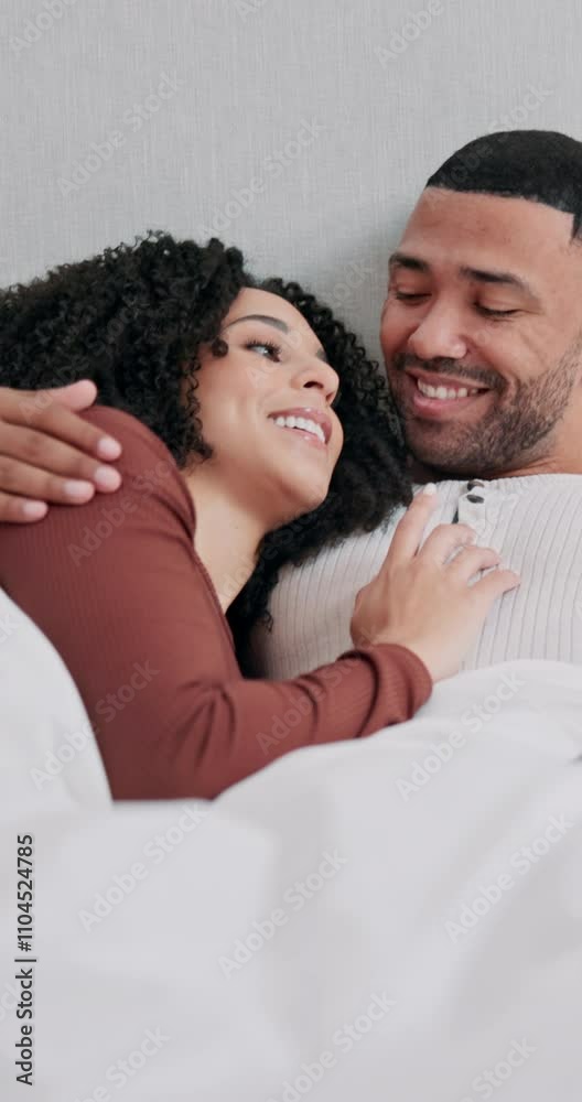Love, morning and couple hug in bed with smile, laughing and ...