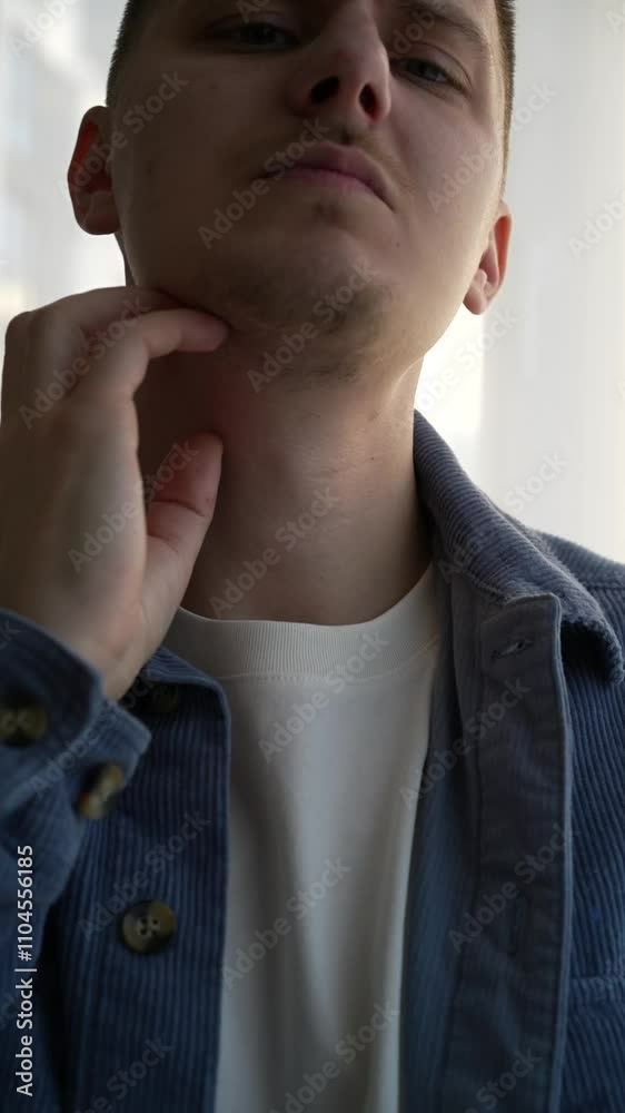 Skin problems. A man scratches his neck. Skin rash. Irritation on the ...