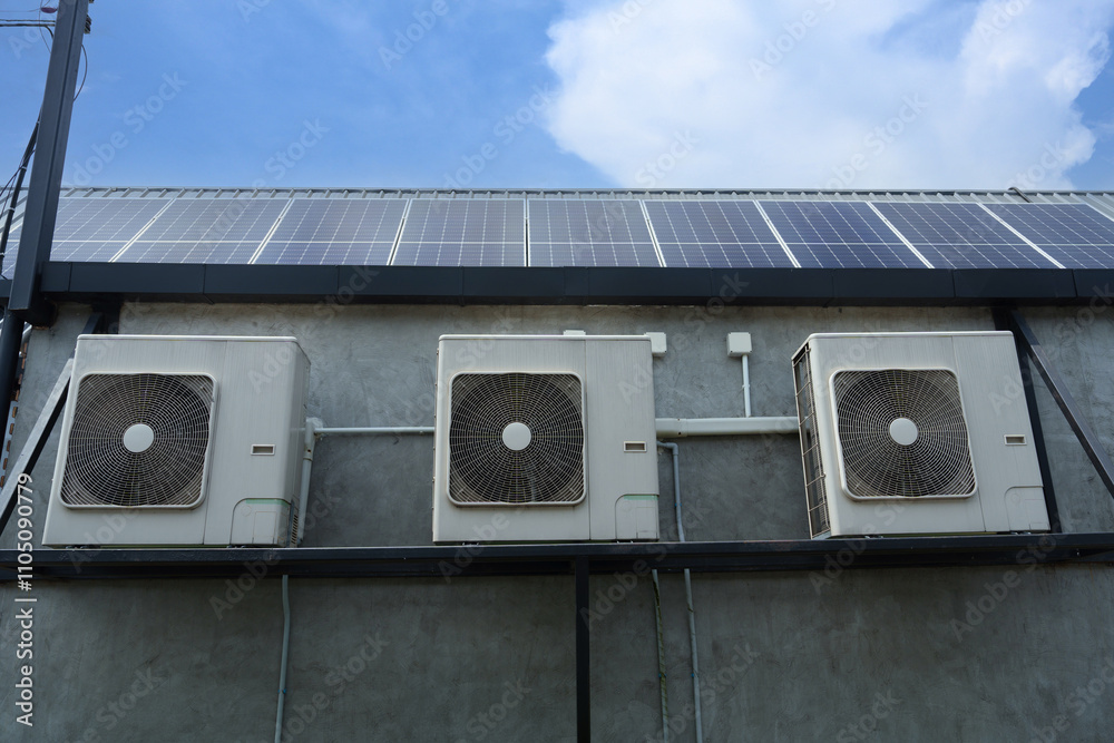 Air compressor or air condenser unit located on support outside ...