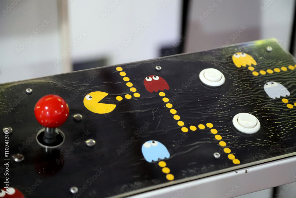 Close-up of joystick of classic Pacman arcade video game. Video game ...