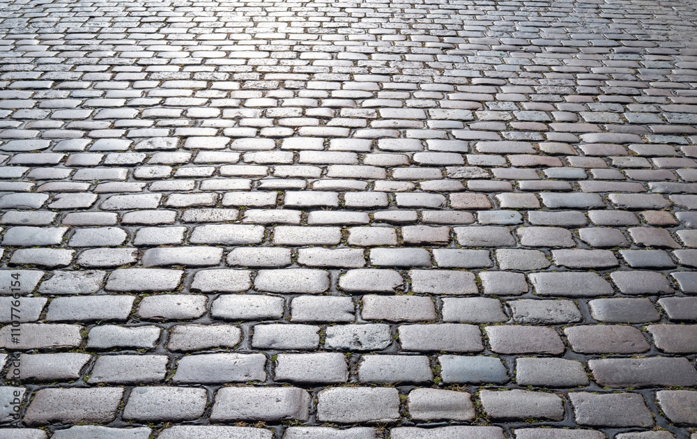 Pavement road. Background of bricks road. Stone cladding pavement ...