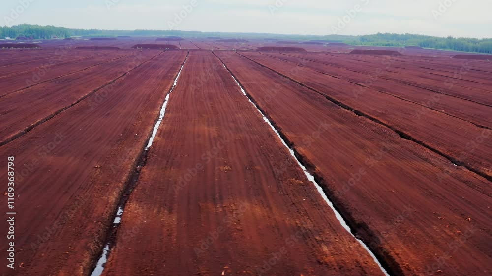 Drone view of peat bog and peatlands. A vast peat extraction field ...
