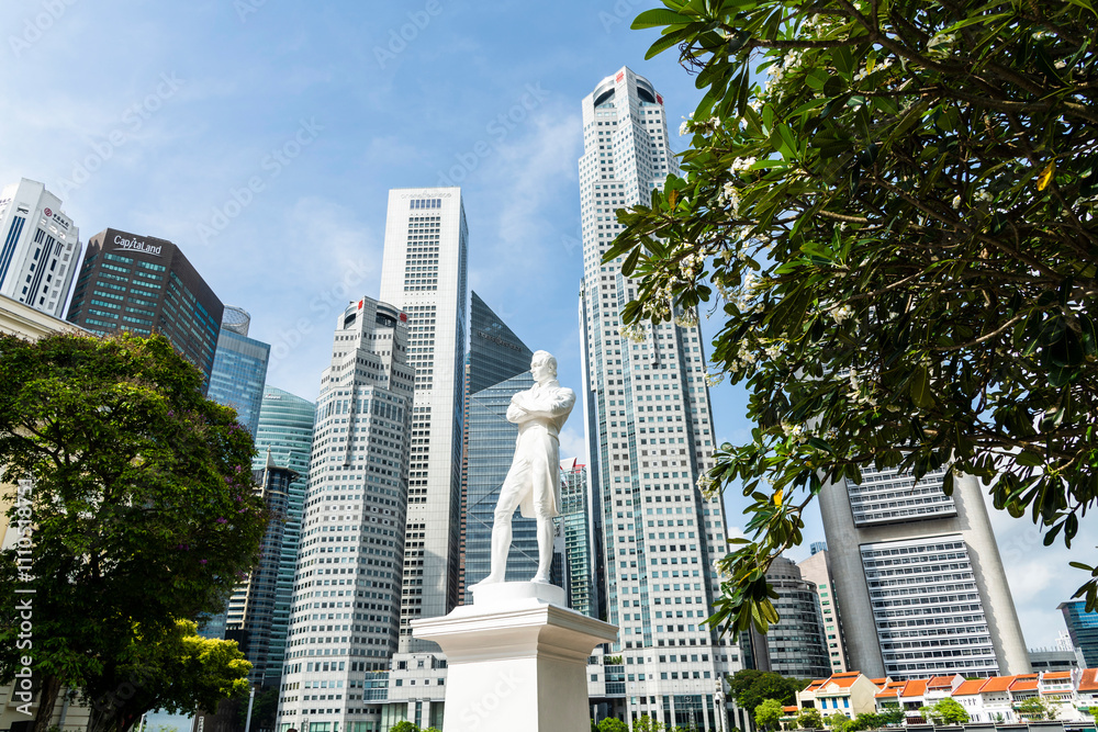 Singapore- July 17, 2024: Low-angle view of the statue of Sir Stamford ...