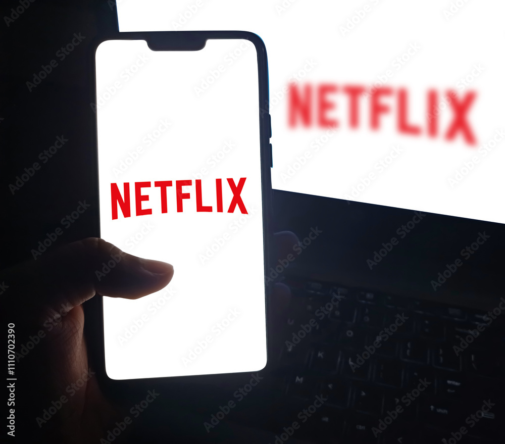 Person using Netflix on mobile screen for streaming movies and series ...
