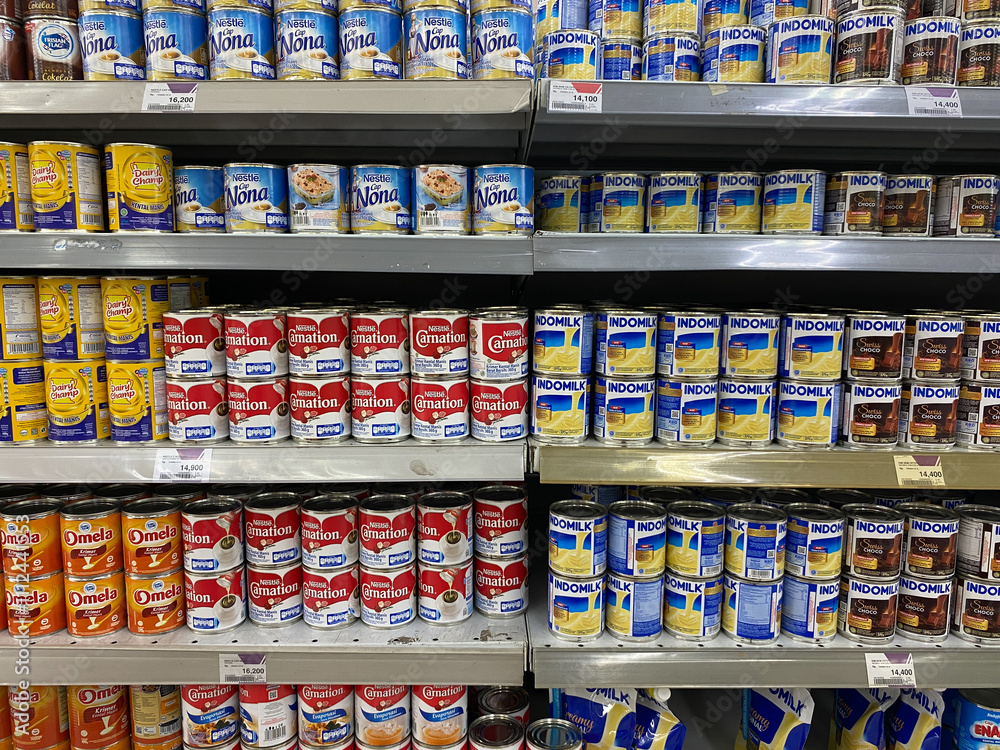 Various sweetened condensed milk brands at Indonesia, displayed on ...