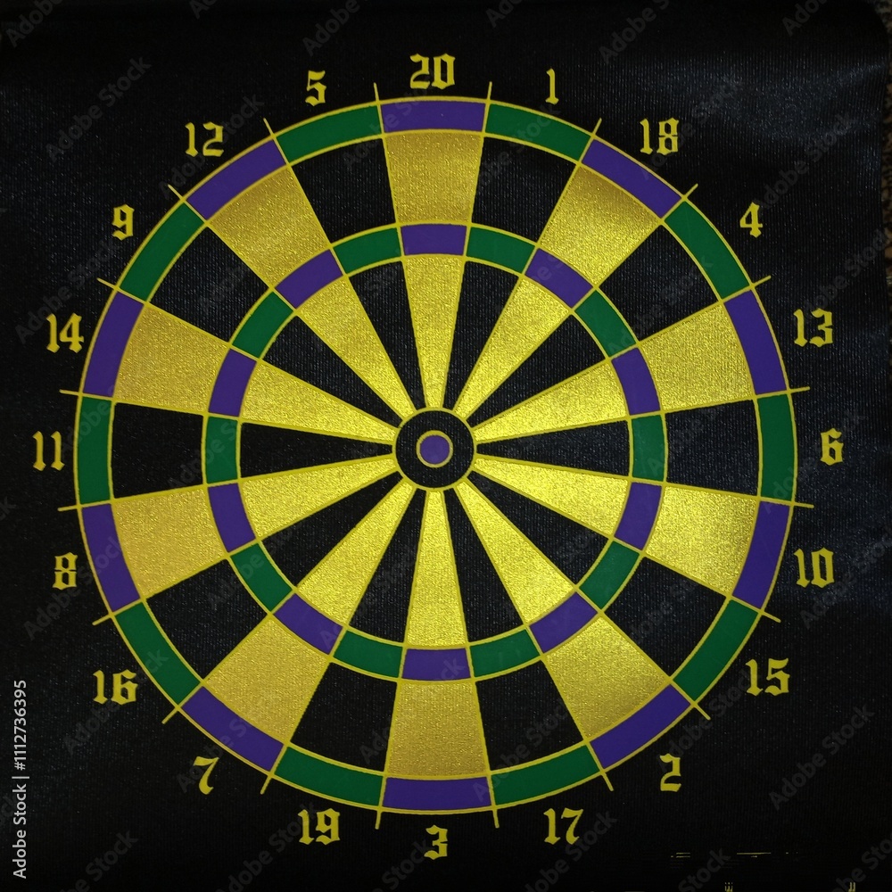 Black and yellow dartboard divided into sectors. Special round ...