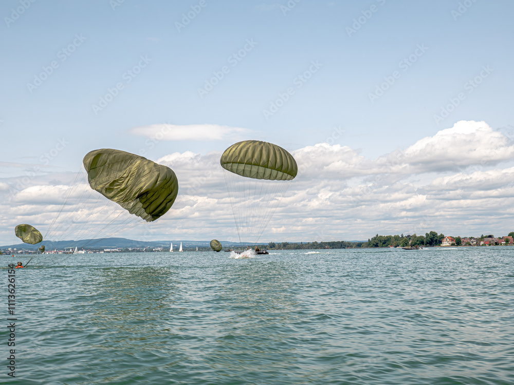 Poster German paratroopers participate in a NATO exercise, descending ...