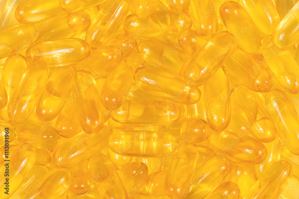 Omega 3 tablets background texture. yellow pills close up. Fish oil ...