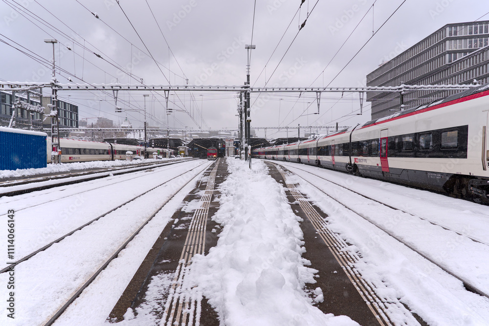 Scenic view of snow covered railroad track field at railway main ...