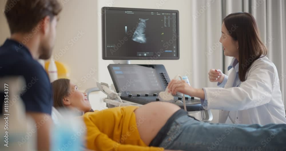 Asian Obstetrician Conducts Prenatal Ultrasound for Smiling Expectant ...