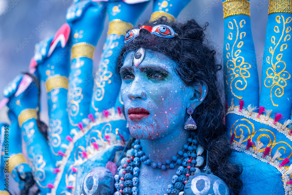 Kulasai Dasara, Portrait of indian male with painted face and dressed ...