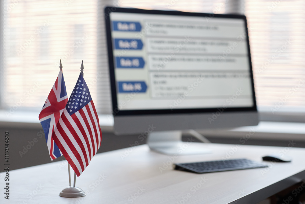 Close up on small national flags of USA and Great Britain standing on ...