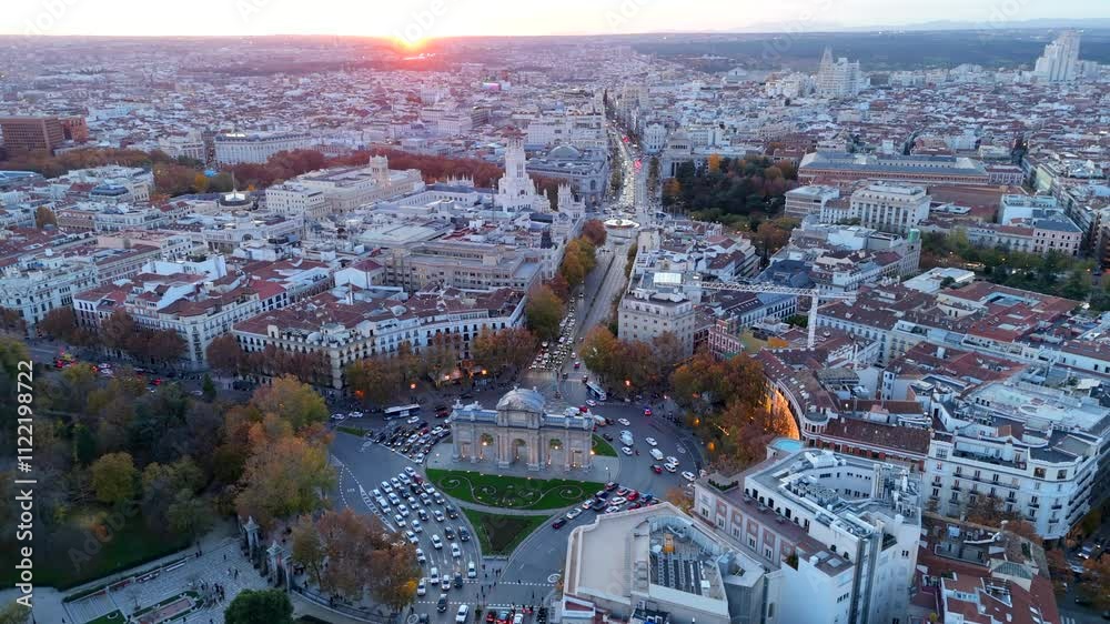 Cinematic aerial view of Madrid highlights El Retiro Parks greenery and ...