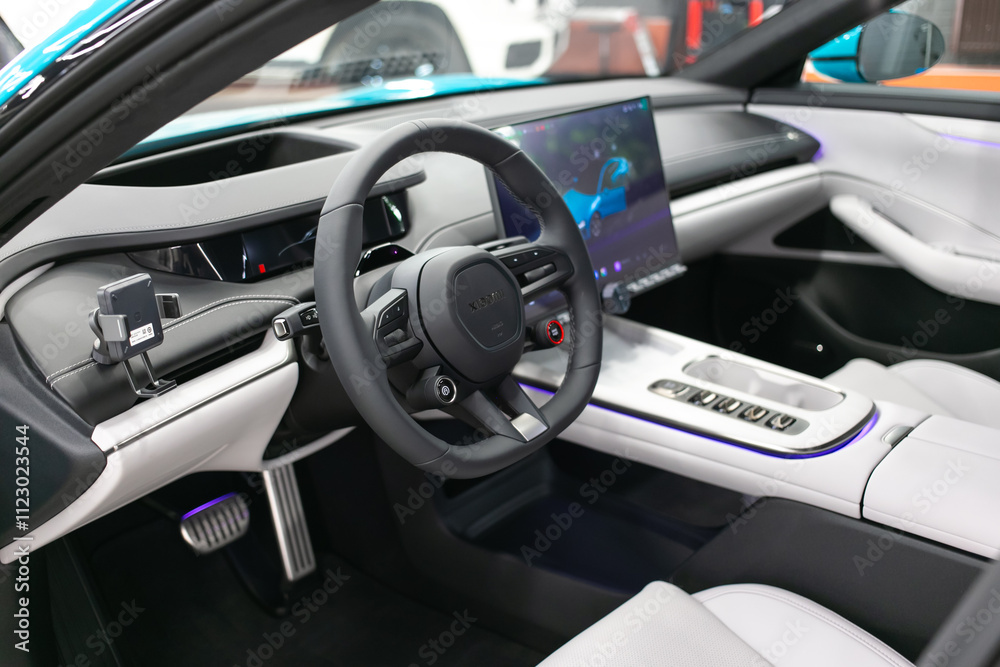 Xiaomi SU7 car from the China brand. Luxury car interior, steering ...
