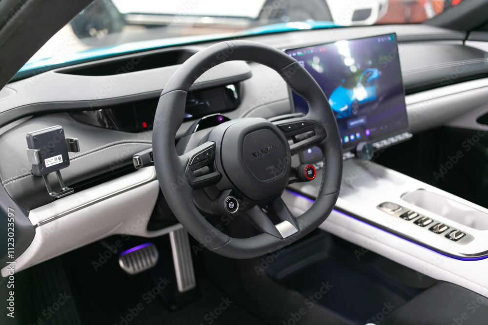 Xiaomi SU7 car from the China brand. Luxury car interior, steering ...
