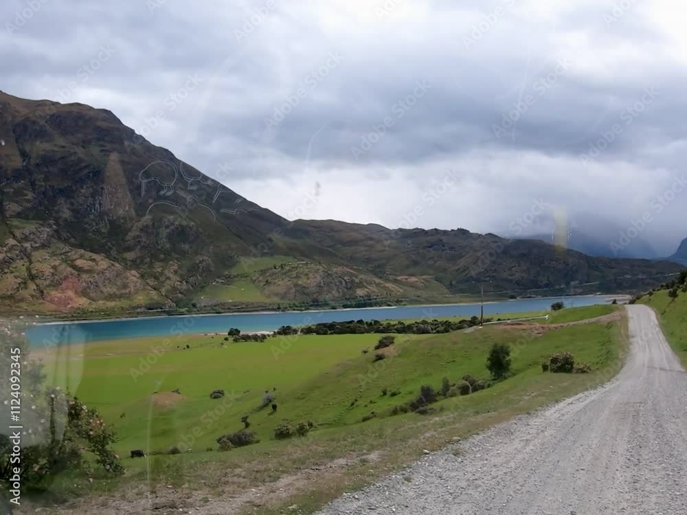 Driving on the road through mountain ranges, lake views and beautiful ...