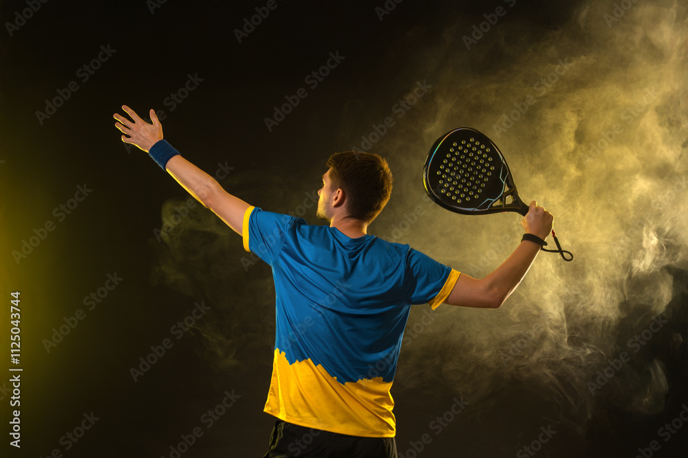 Padel Player with Racket in Hand. Paddle Tennis, on a black background ...