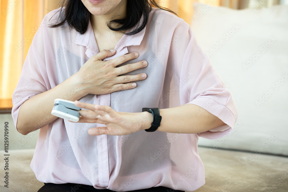 Tired asian woman suffering Thyrotoxicosis,overactive thyroid,fast ...