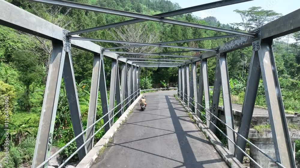 Video of B60 type steel truss bridge replacing the old collapsed bridge ...