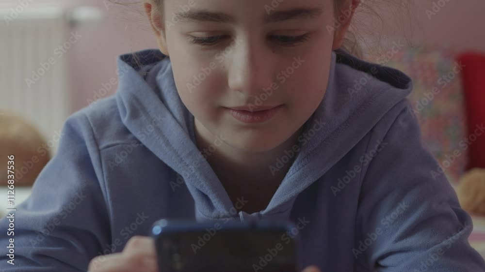Child Using Mobile Phone Writes Messages in Chat at Home. Teen Girl ...