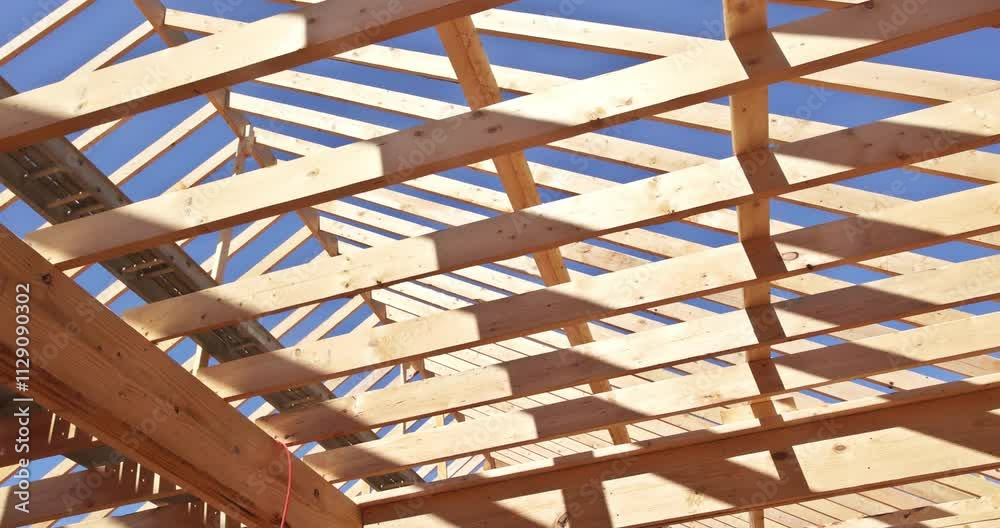 Wooden beams supporting an open roof structure integrated into large ...