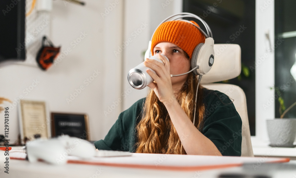 Teenage gamer immersed in an intense video game session. Medium shot ...
