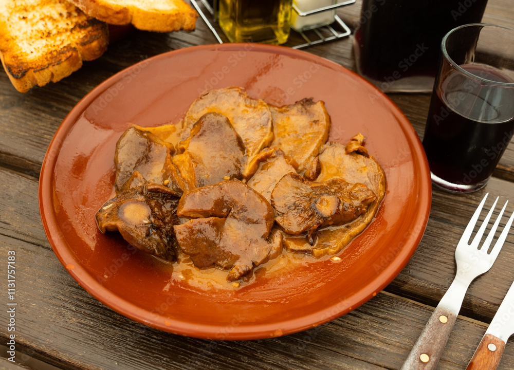 Veal calf meat is cooked with mushrooms saffron milk cap and cream ...