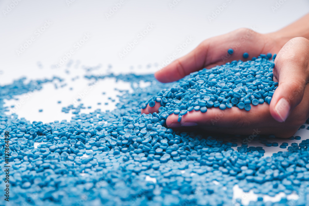 Blue plastic grain, plastic polymer granules,hand hold Polymer pellets ...