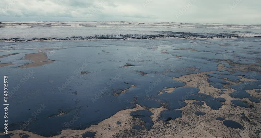 Sea and the beach are polluted with fuel oil. Beach oil spill impact ...
