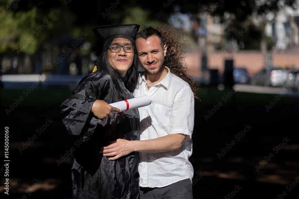 Latin transgender woman recent graduated, dressed in cap and gown ...