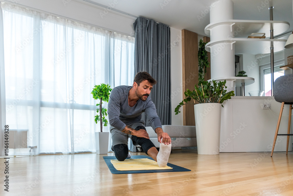 Home workout. Young healthy happy self aware confident man practicing ...