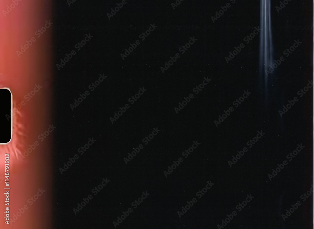 detail scan of blank old super 8mm film frame with dust, light leaks ...