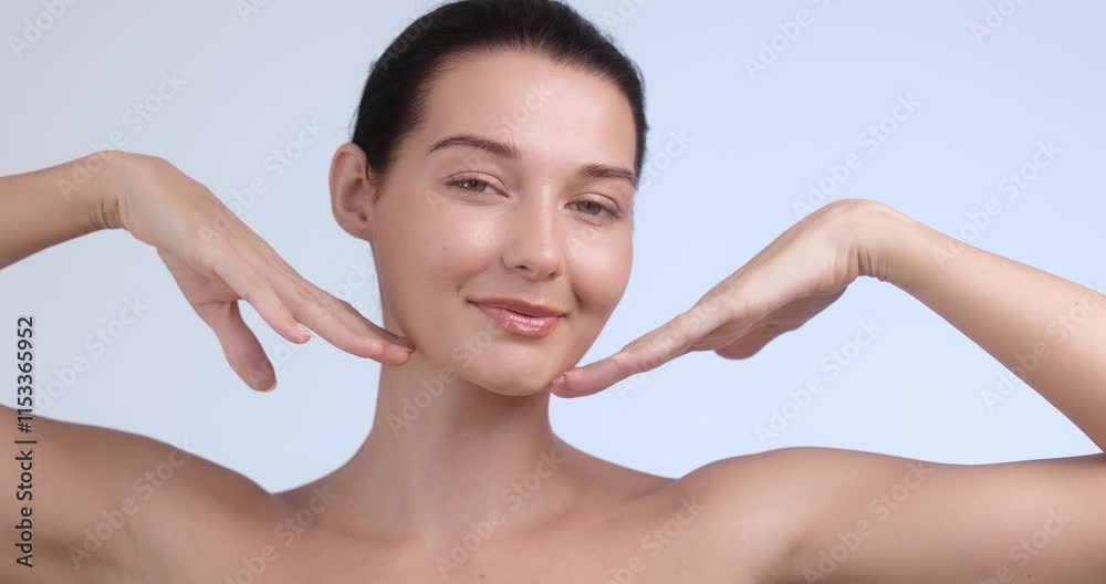 Close-up of a cheerful woman with radiant skin and a youthful ...