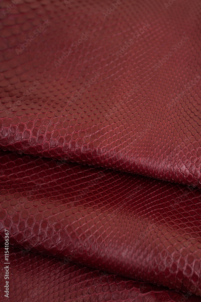 Snake skin fabric texture with waves and folds. Background with a ...