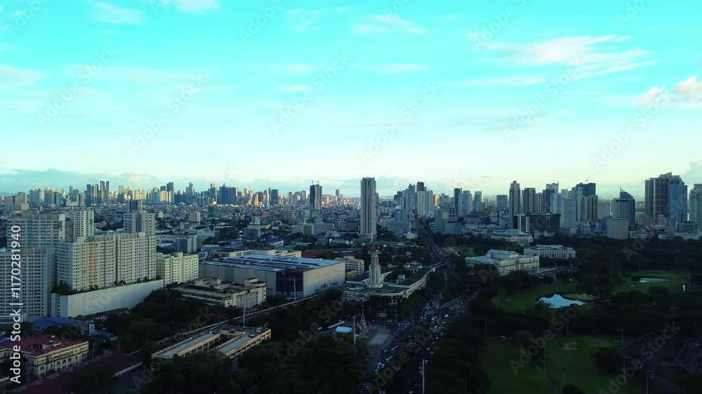 A broad aerial perspective over Intramuros, Manila, blending historic ...
