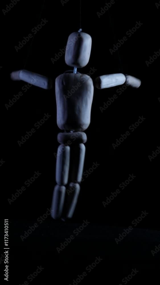Vertical, Wooden mannequin suspended in darkness. Spooky wooden figure ...