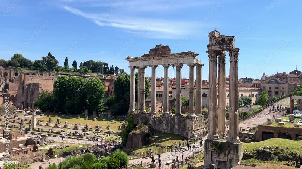 Ancient Roman Forum in Italy with iconic temple ruins under a clear ...