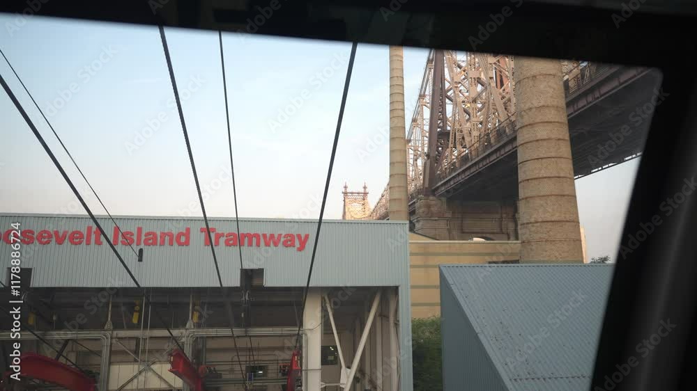 The Roosevelt Island Tramway station alongside the iconic Queensboro ...