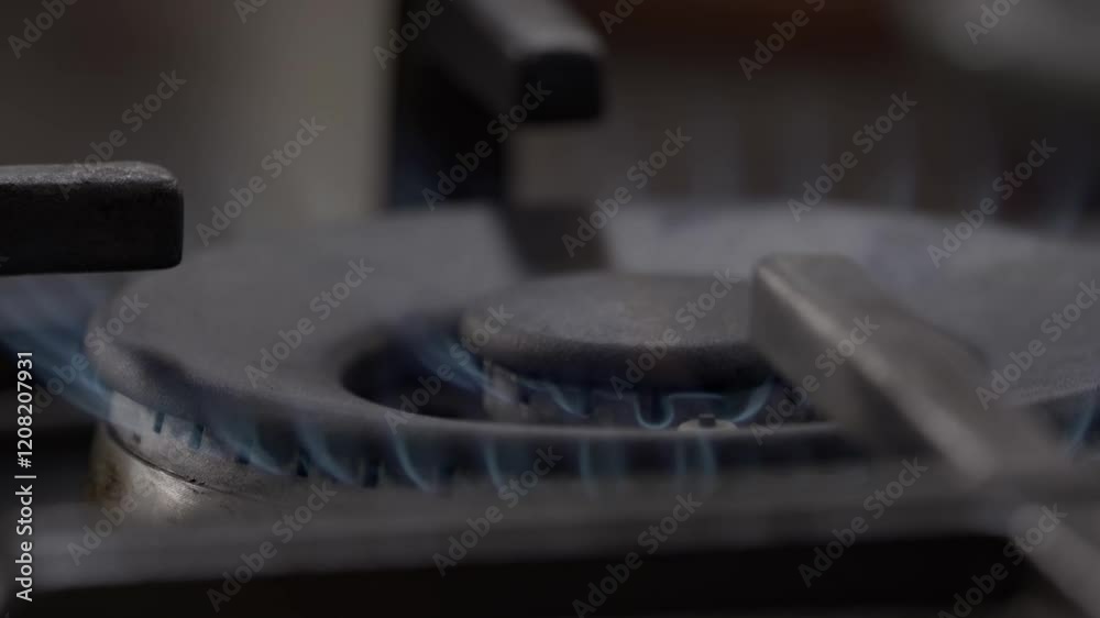 Video Stock Turning on and off the fire on the gas stove. A spark ...