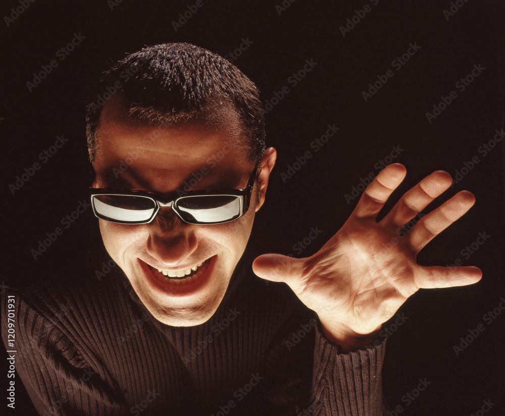 Poster Scare villain face man hand open on black background. – Wall Art ...