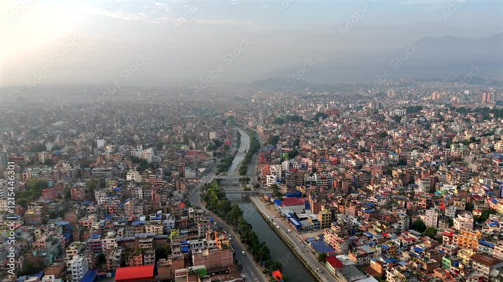 Aerial view of a river winding through the city of Kathmandu, Nepal ...