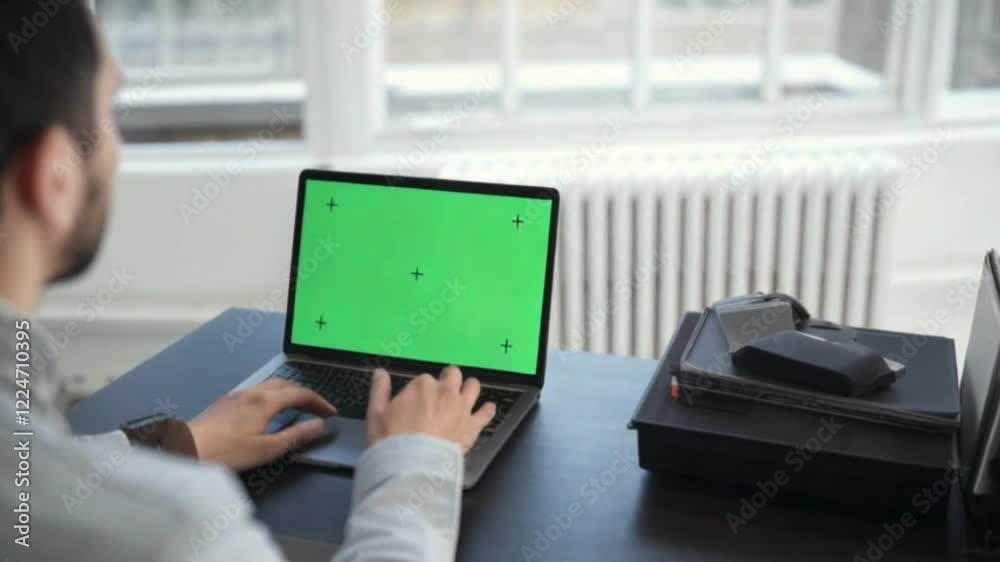 Laptop Computer Monitor Standing on a Desk with a Green Screen Chroma ...
