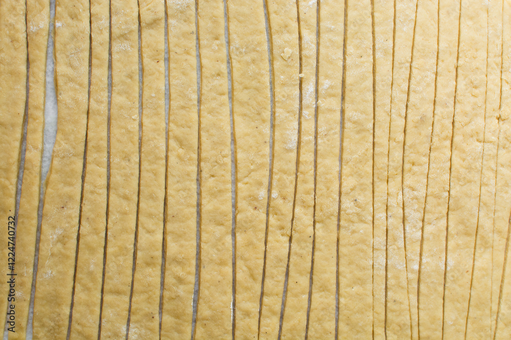 Poster Nigerian Chin chin dough on a white granite countertop, Raw chin ...