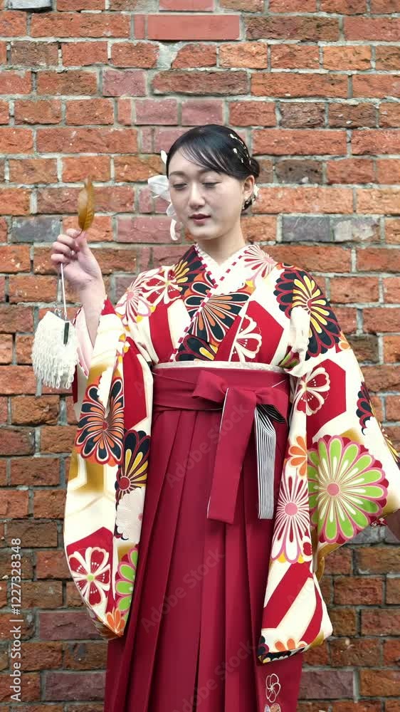 Young women in their 20s wear traditional hakama (kimono) in Japan ...