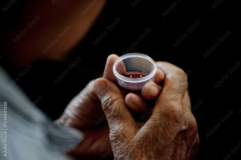 Poster Old Woman Hand Holding Wine in a Holy Communion. – Wall Art ...