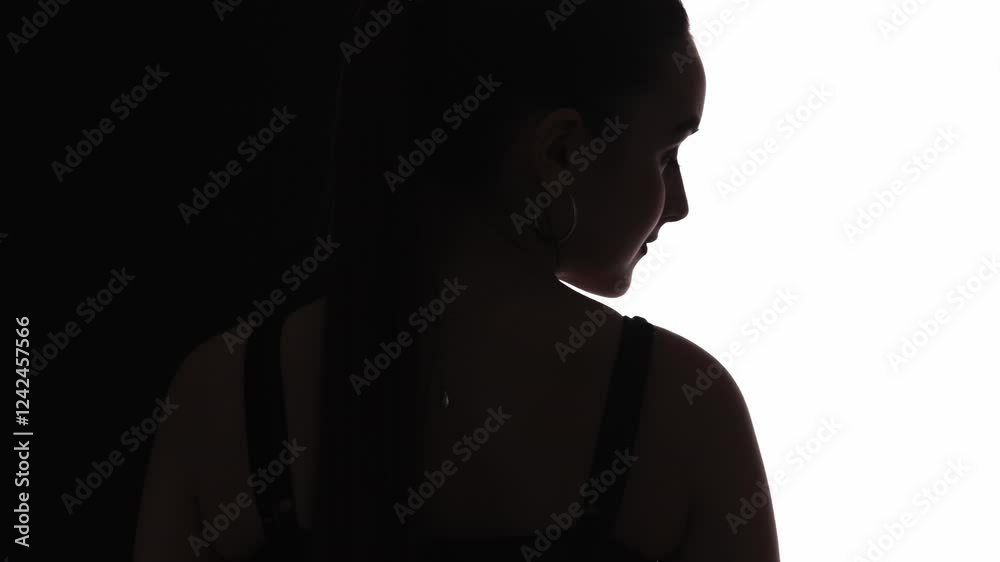 Pensive silhouette. Female loneliness. Dark contrast back view outline ...