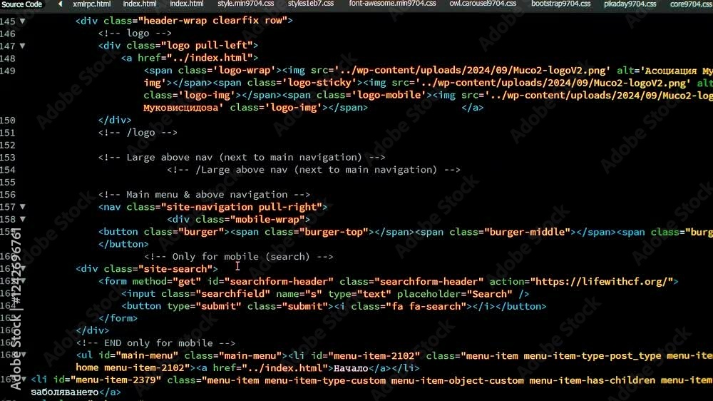 Developer is Browsing HTML Code on the Computer Screen. Front view. HTML Web Page Code Scrolling ...