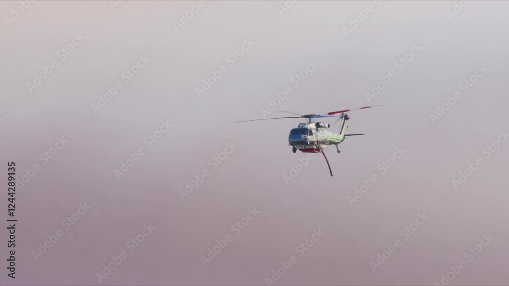 In January 7, 8, 9, 2025, a helicopter bravely fights a devastating ...