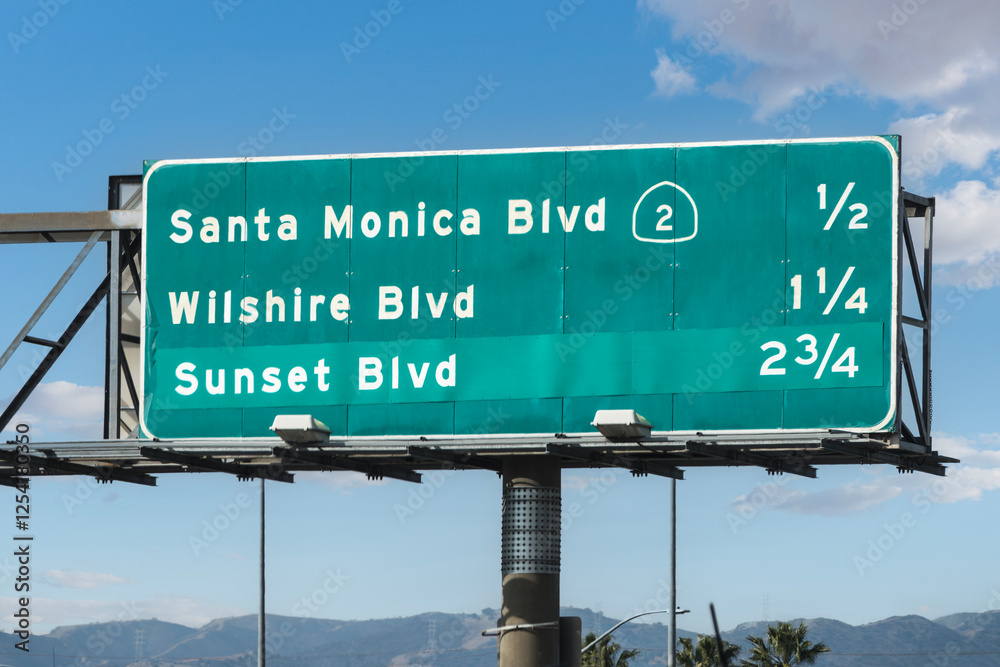 Poster Santa Monica Blvd, Wilshire Blvd and Sunset Blvd exit sign on ...
